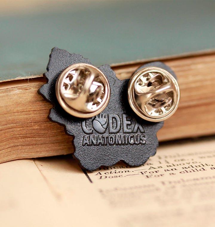 Anatomical pelvis enamel pin - Medical Gifts - Codex Anatomicus