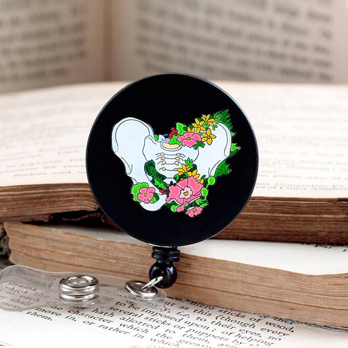 Pelvic bone badge reel - Medical Gift - Codex Anatomicus